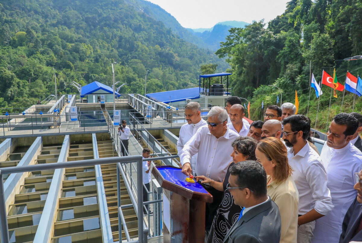 Aranayaka "Asupini Ella" water project to the right of people - Buzzer